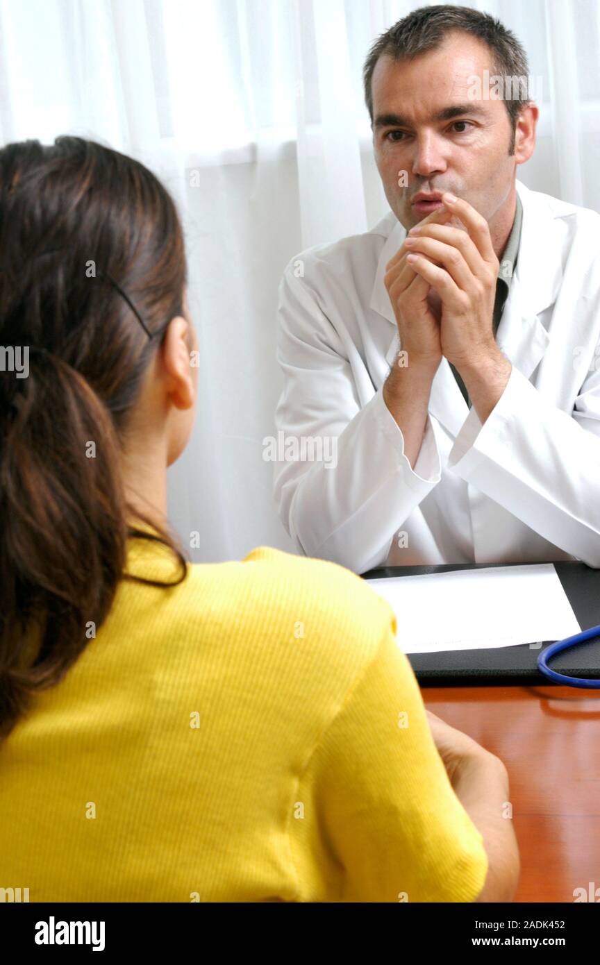 Medical consultation. Doctor giving medical advice to a patient Stock ...