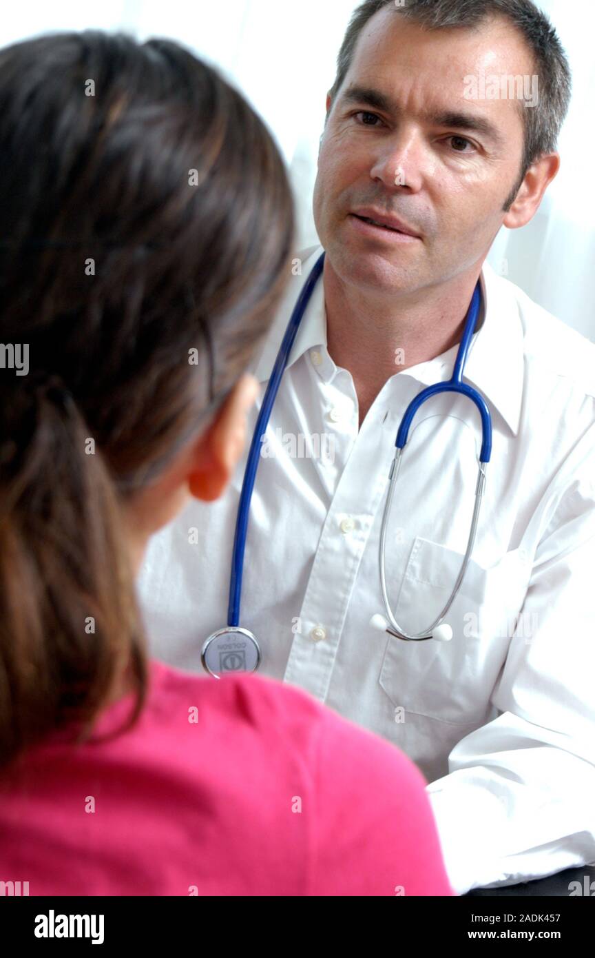 Medical consultation. Doctor giving medical advice to a patient Stock ...