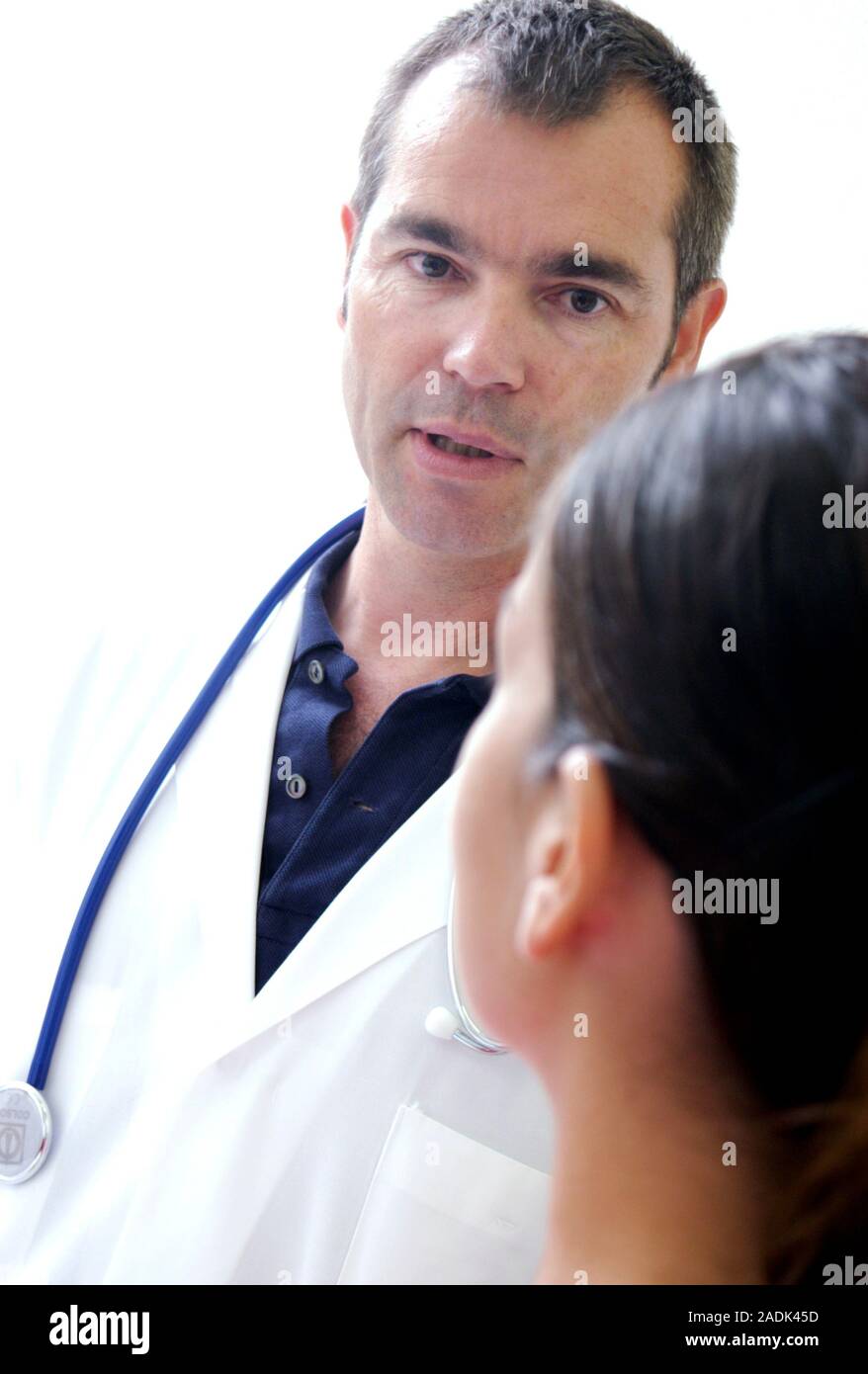 Medical consultation. Doctor giving medical advice to a patient Stock ...