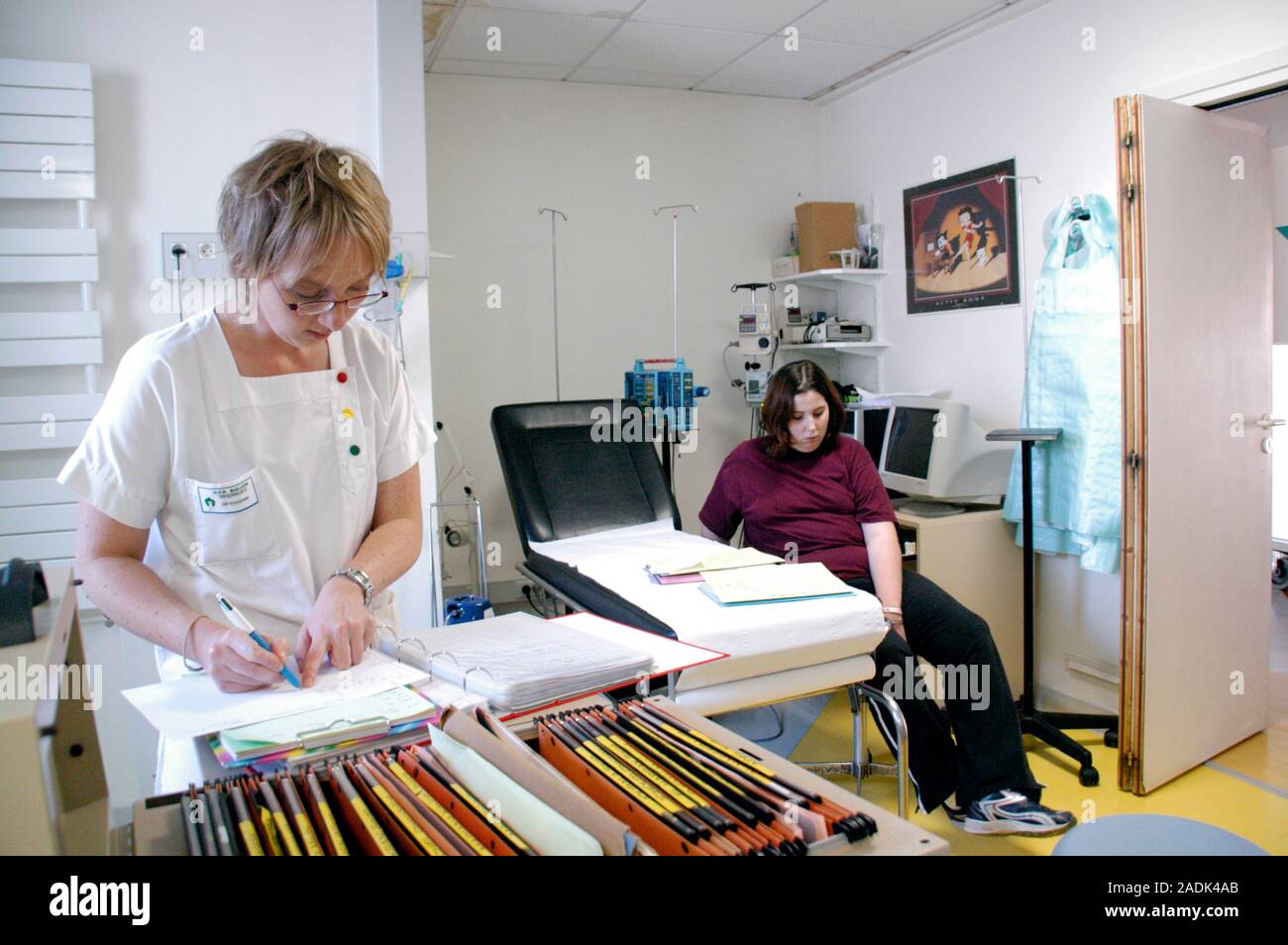 MODEL RELEASED. Dietitian and patient consultation at a hospital ...