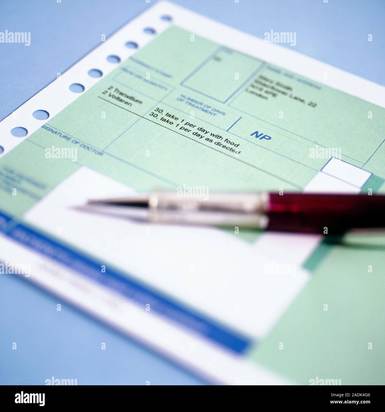 Medical prescription slip and pen Stock Photo - Alamy