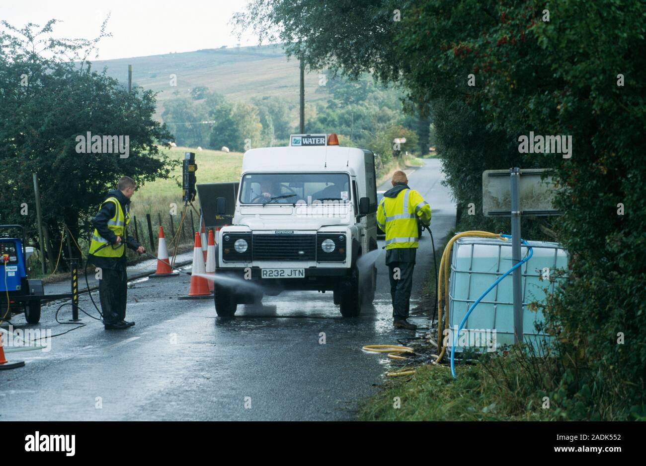Foot-and-mouth disease (FMD) containment. Vehicle being sprayed with ...