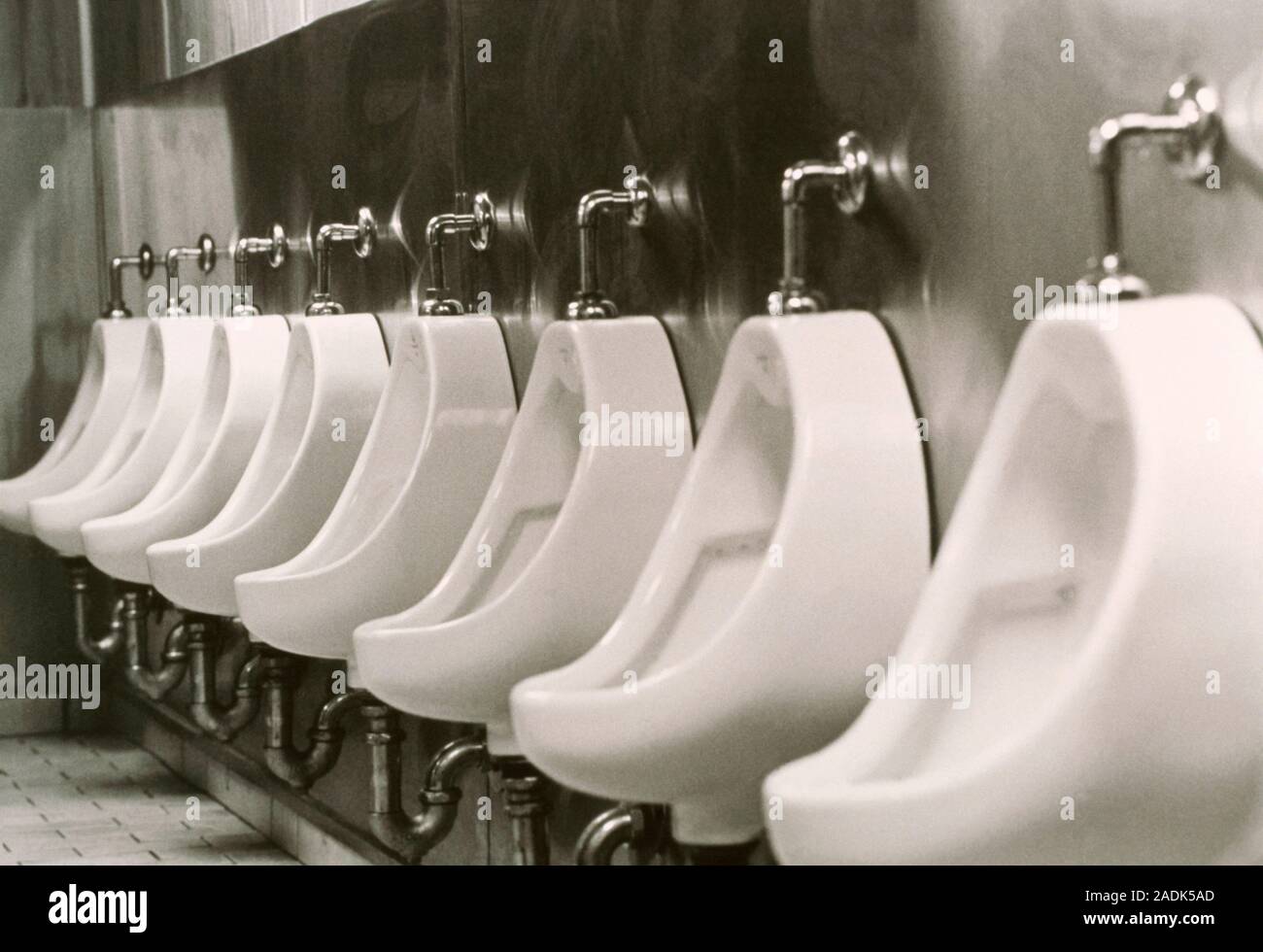 Row of urinals Stock Photo - Alamy