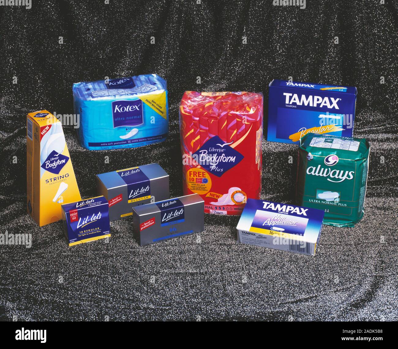 Feminine hygiene products. Assortment of packaged sanitary towels and ...