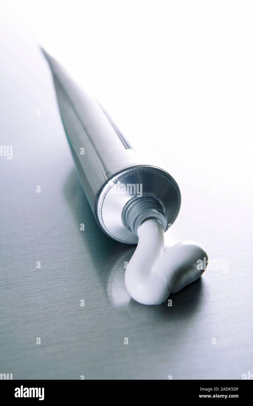 Toothpaste oozing from a tube Stock Photo - Alamy