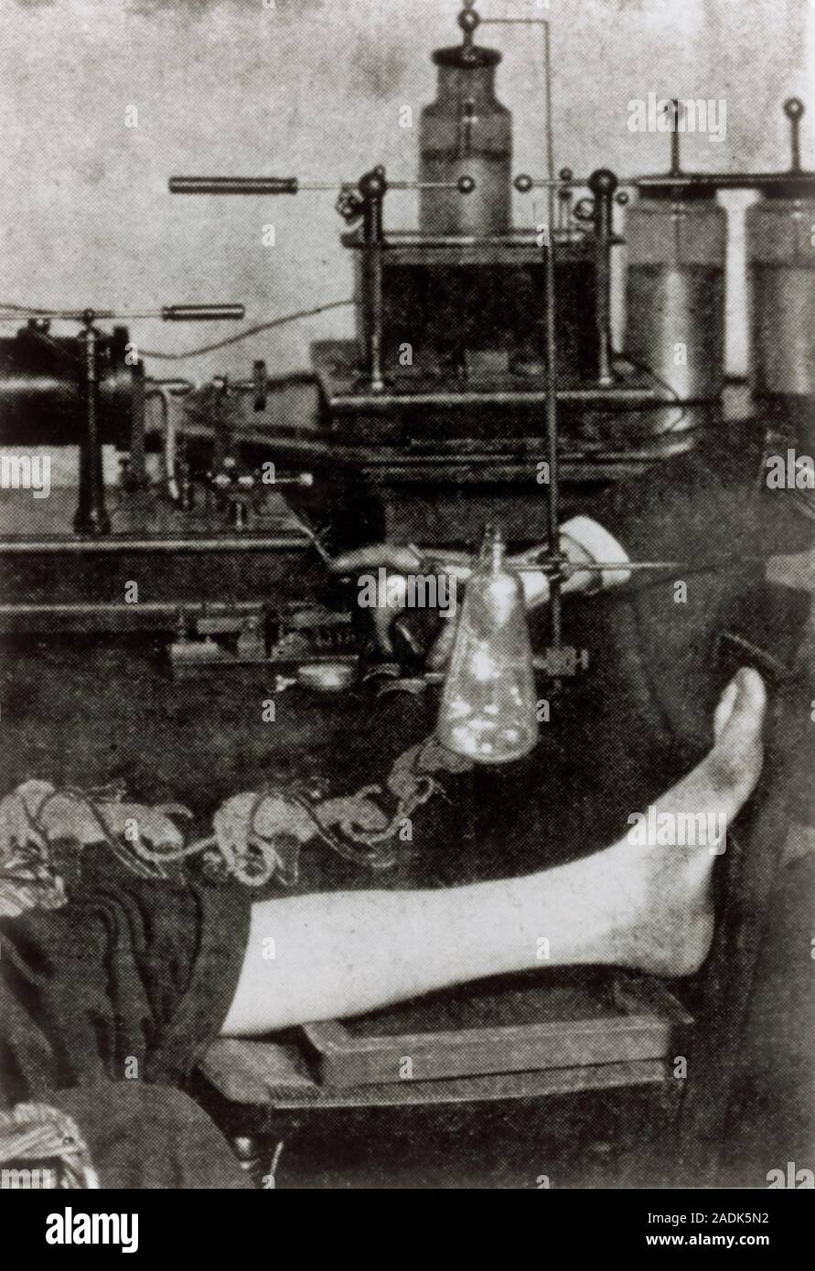 First photograph to show a patient being positioned for a medical X-ray ...