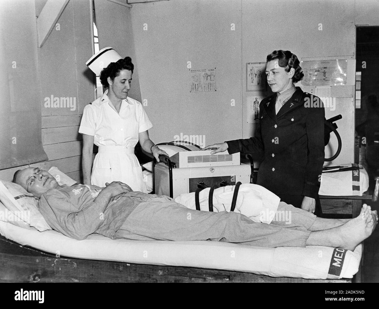 Electric therapy. Historical image of a man's leg being treated by ...