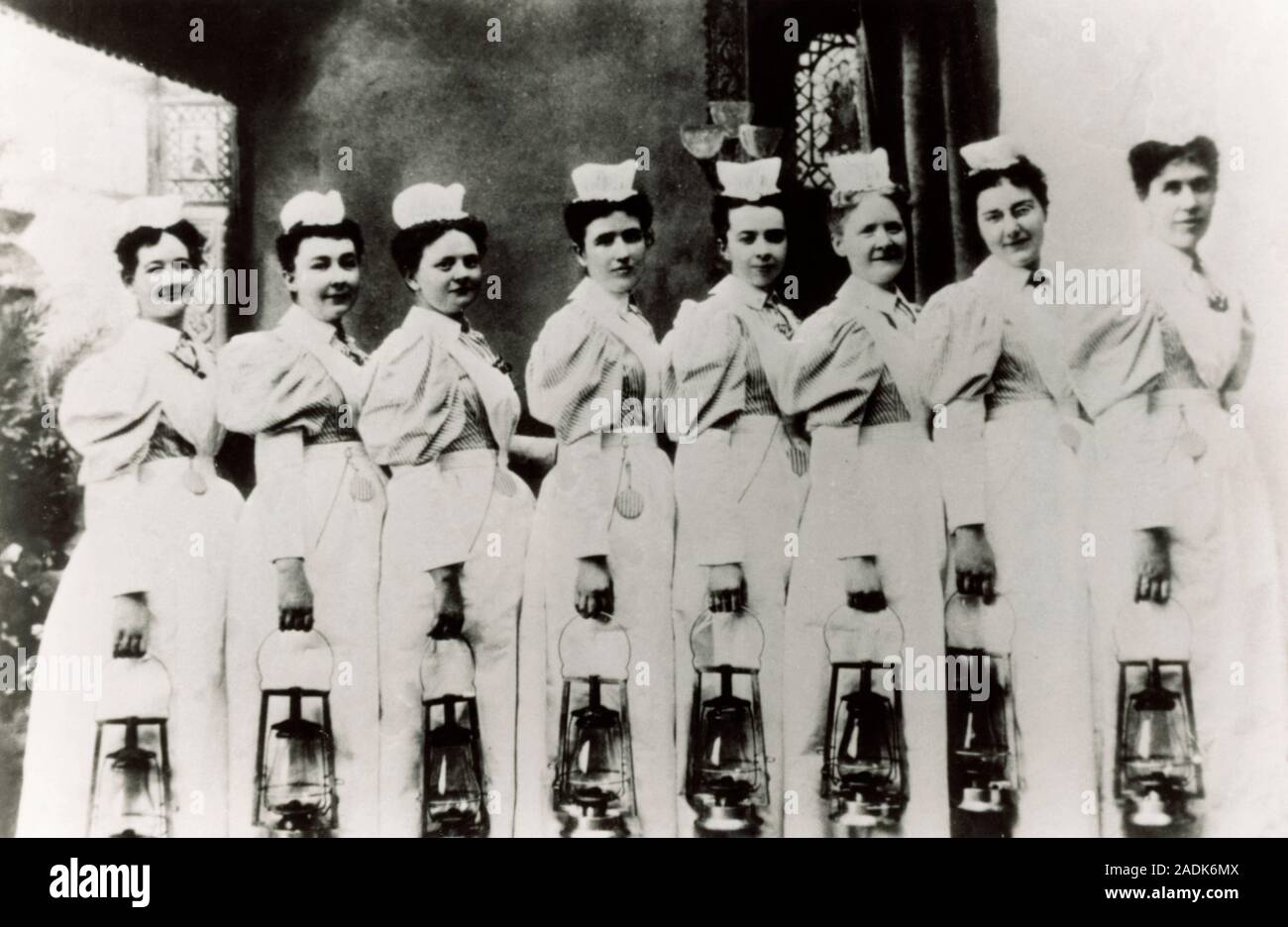 Eight nurses with kerosene lamps, about to make ward rounds at Yale-New ...