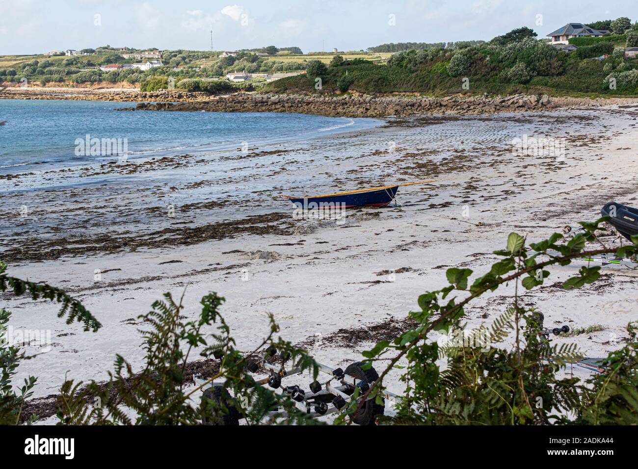 A blue wooden boat on Porthmellon beach, St Mary's, Isles of Scilly ...