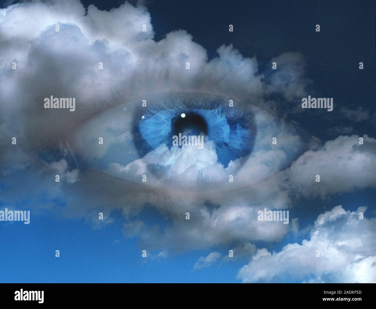 Eye with clouds. Abstract computer graphic of a human eye, superimposed ...