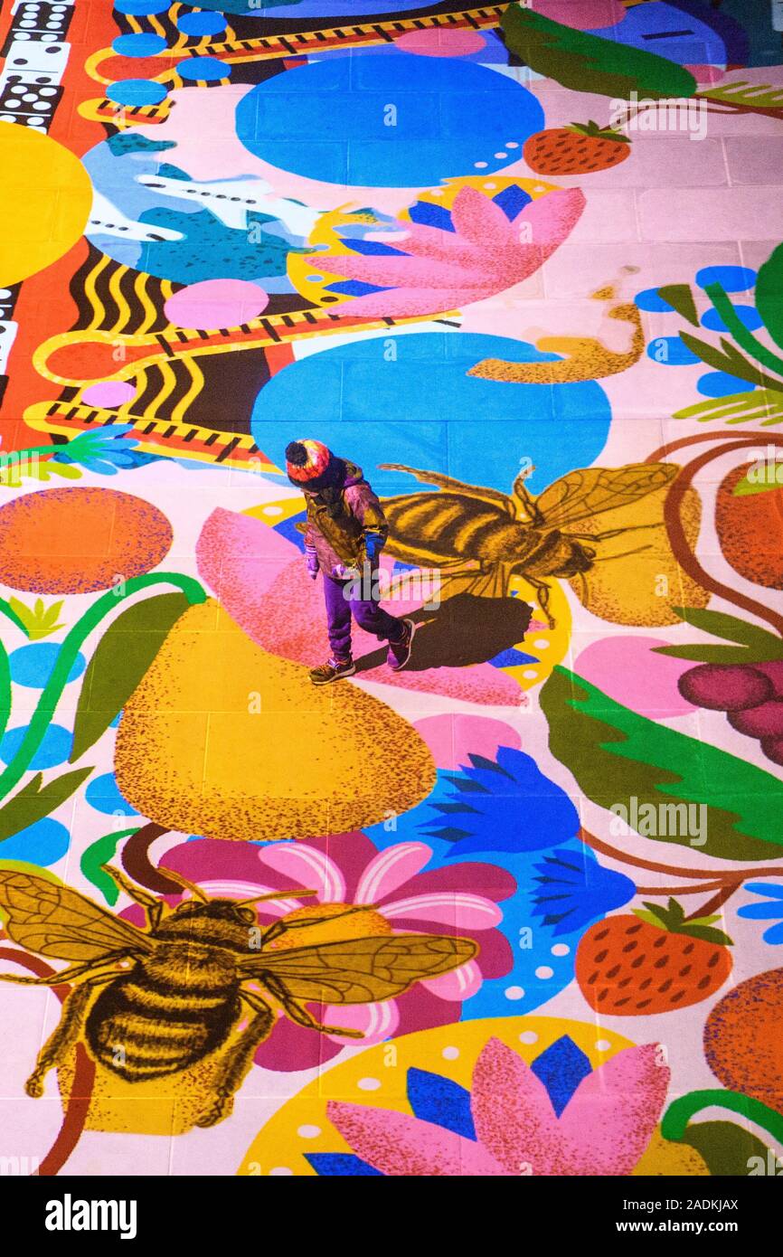 EMBARGOED UNTIL 0001 THURSDAY DECEMBER 5 Passers-by interact with ...