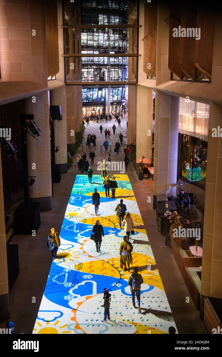 EMBARGOED UNTIL 0001 THURSDAY DECEMBER 5 Passers-by interact with ...