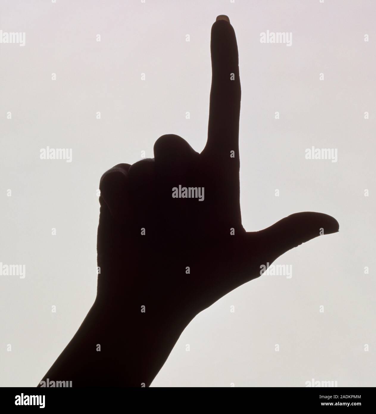 Fingers. Silhouette of a woman's hand with the index finger pointing ...