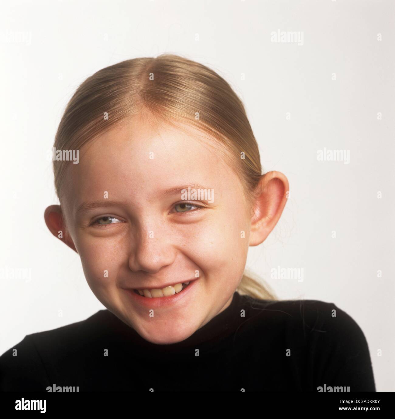 MODEL RELEASED. Smiling ten year old girl Stock Photo - Alamy