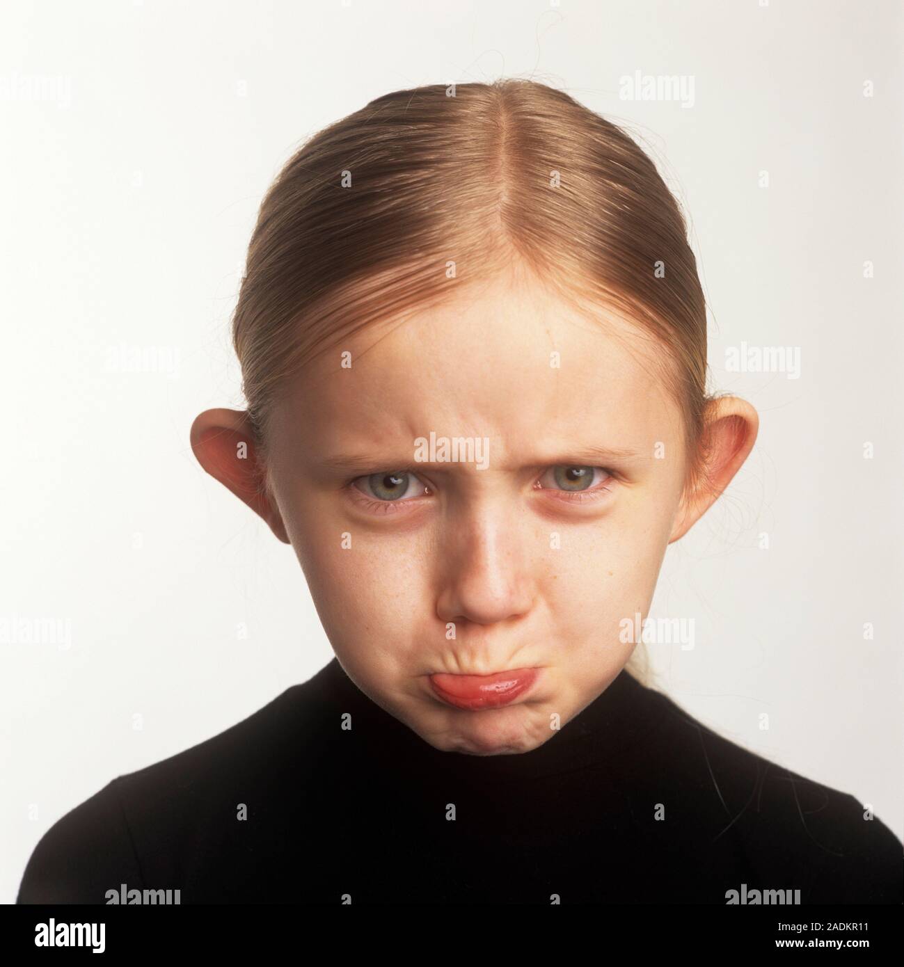 MODEL RELEASED. Grumpy girl Stock Photo - Alamy
