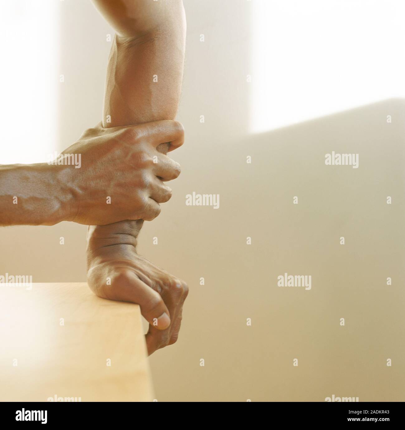 MODEL RELEASED. Strength. Muscular arms of a man Stock Photo - Alamy