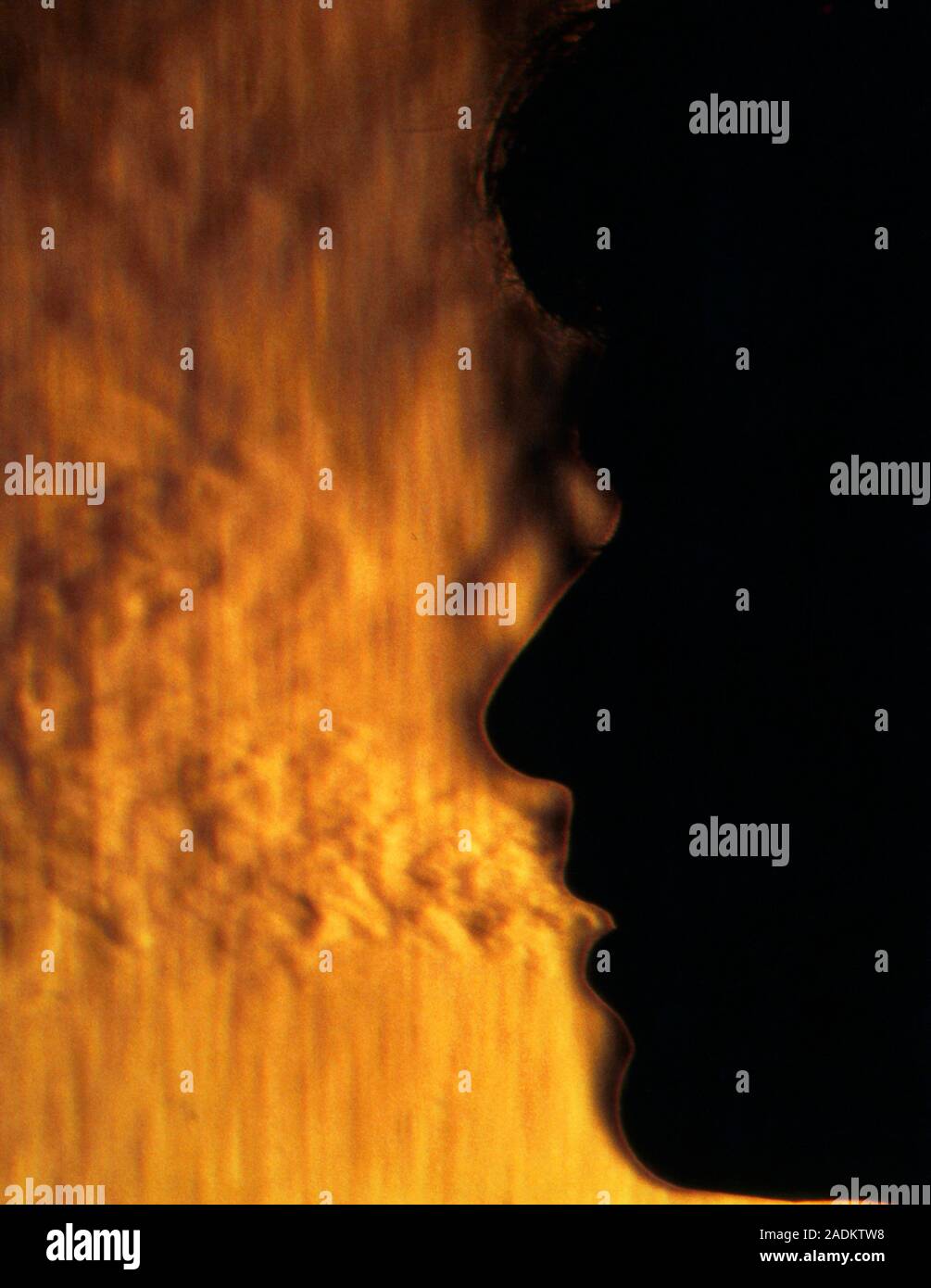 Schlieren photo - man breathing out through the mouth Stock Photo - Alamy