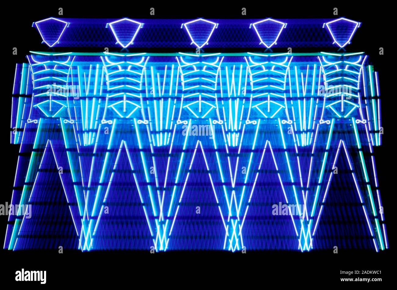 Neon lights. Abstract image of neon light tubes in the form of human ...