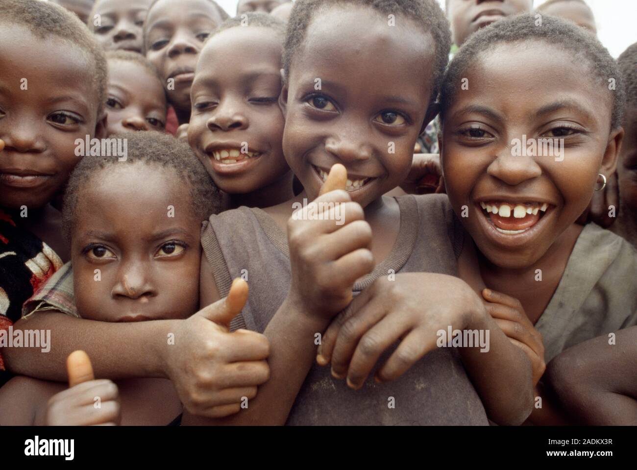 Crowd of smiling African children. Photographed in Daboese, Ghana Stock ...