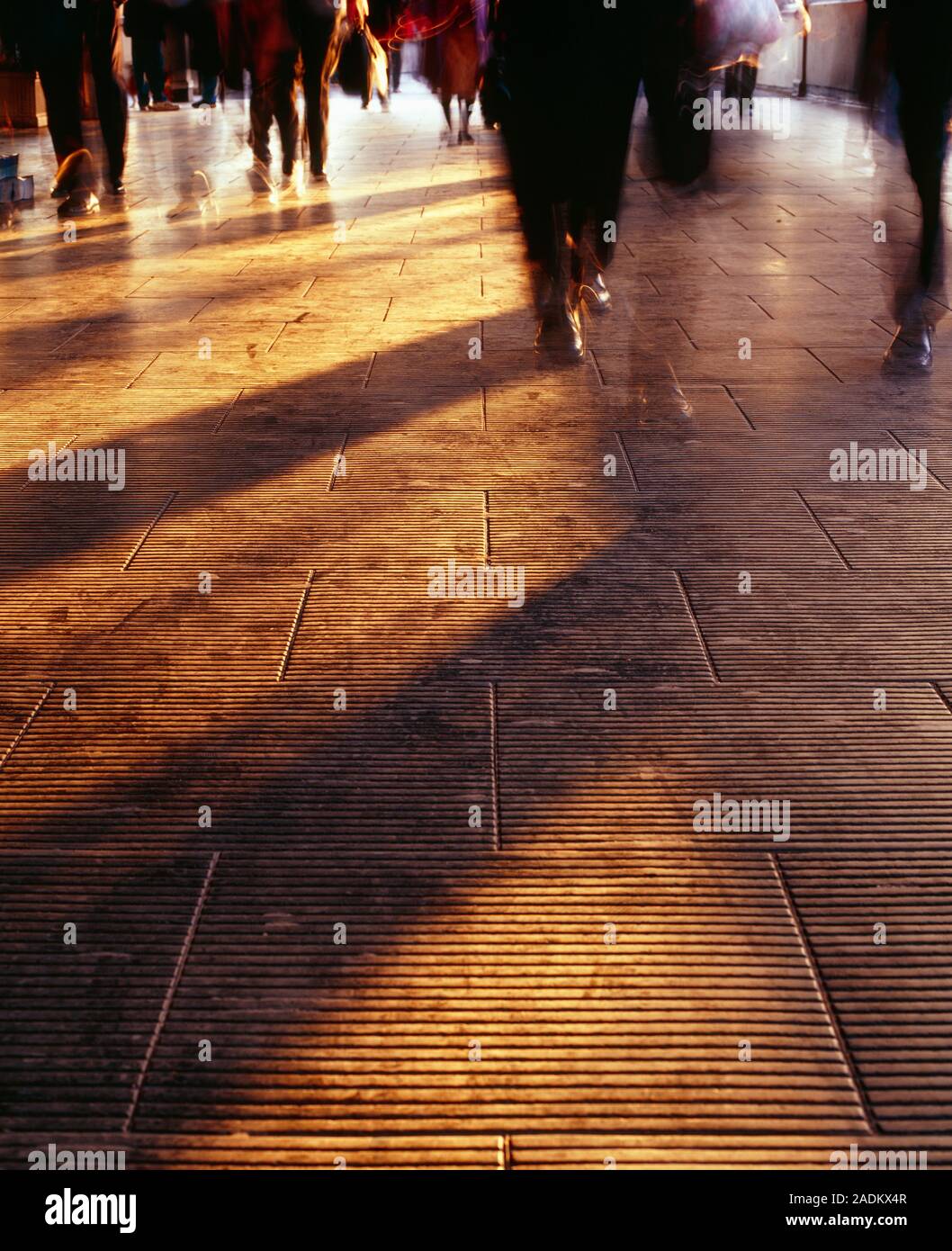 People walking over a floor Stock Photo - Alamy