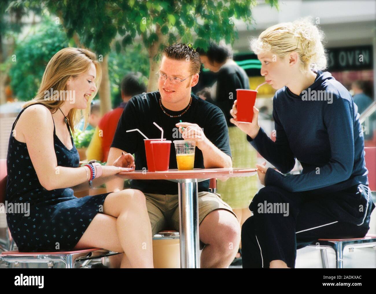 Street cafe. People drinking and socialising at a street cafe Stock ...