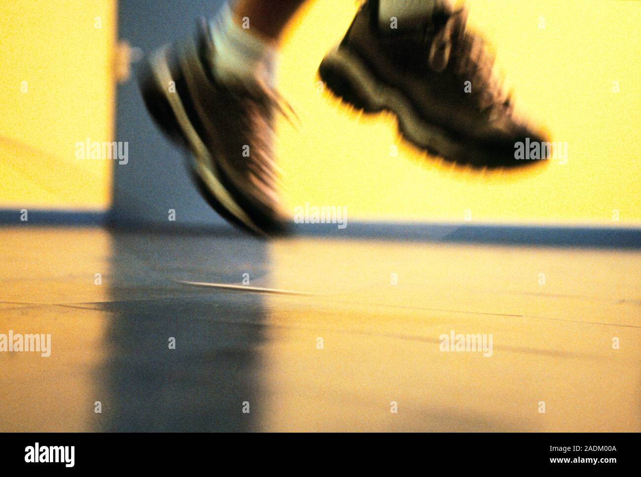 Workout. Woman's feet skipping over a rope Stock Photo - Alamy