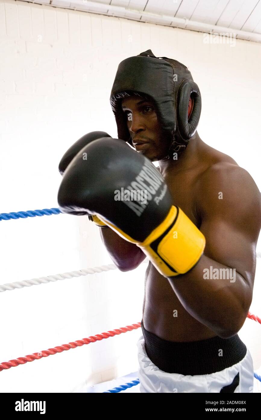 MODEL RELEASED. Boxer sparring with an unseen opponent. Boxing is a ...