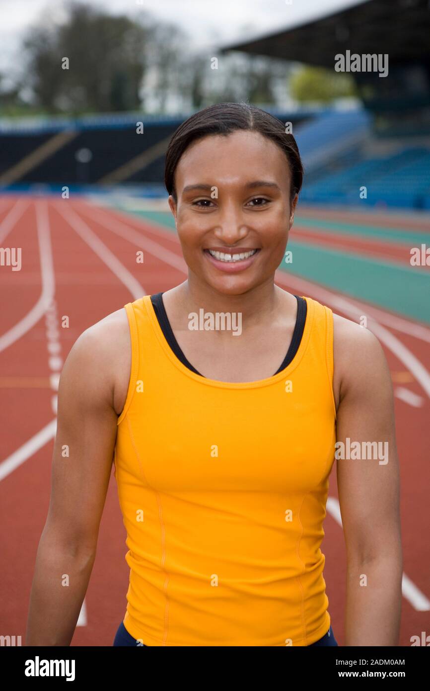 MODEL RELEASED. Athlete at a running track Stock Photo - Alamy