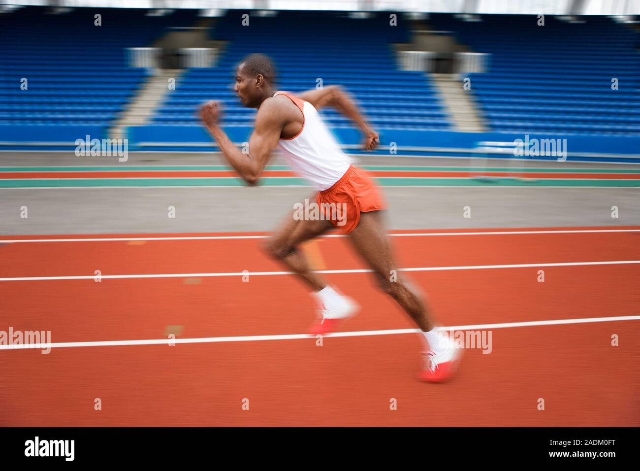 MODEL RELEASED. Athlete running. In athletics running is a track and ...