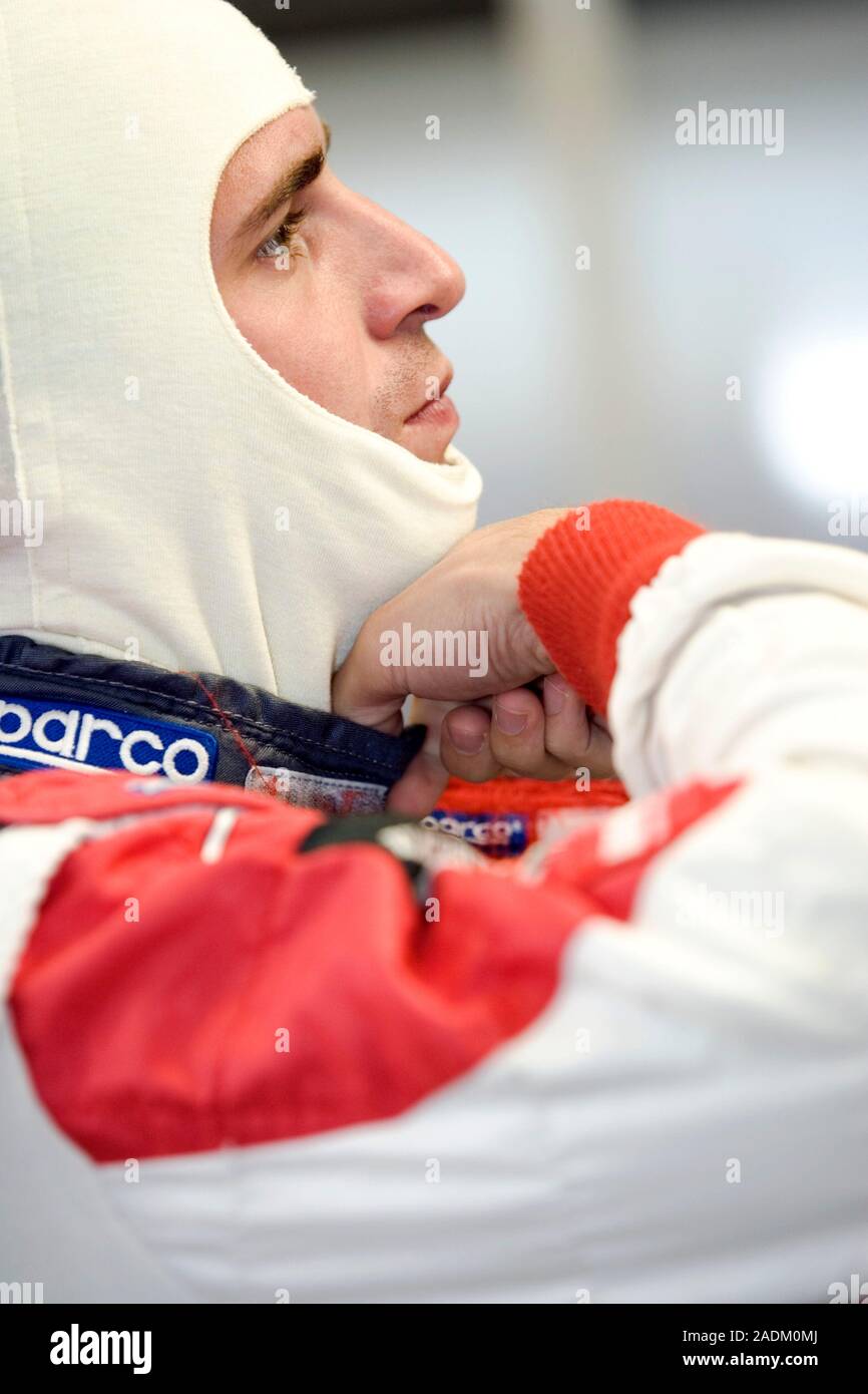 MODEL RELEASED. Formula One racing driver Christijan Albers fitting a ...
