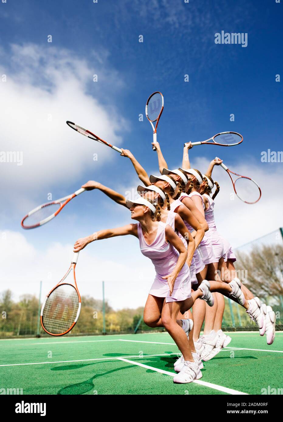 MODEL RELEASED. Tennis player. Composite high- speed photograph of a ...