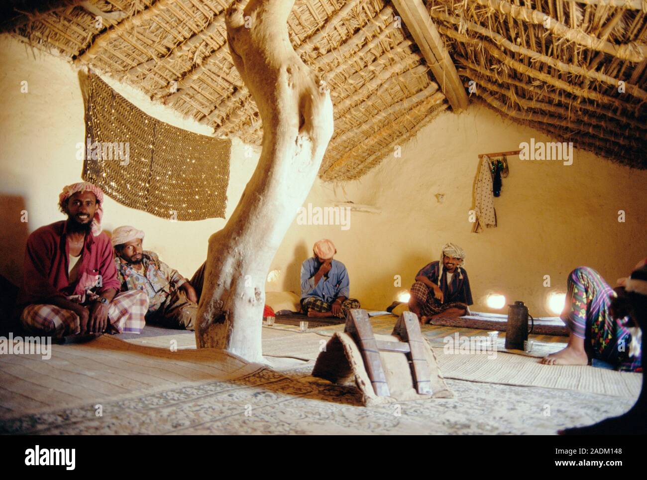 Socotran house. Native men sitting inside a traditional building on ...