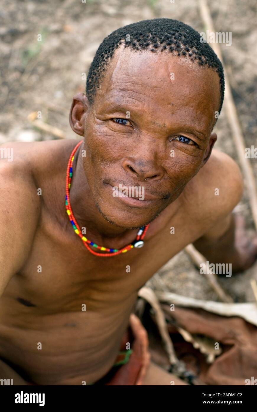 Bushman near Tsumkwe, Kalahari Desert, Namibia. The Bushmen are ...