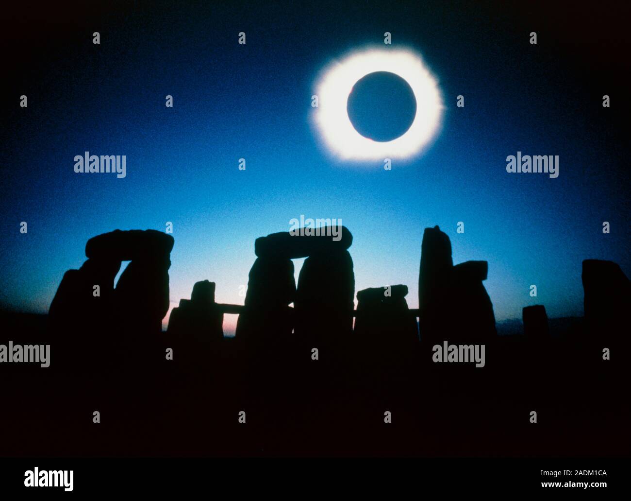 Photograph of a solar eclipse superimposed on an image of Stonehenge ...