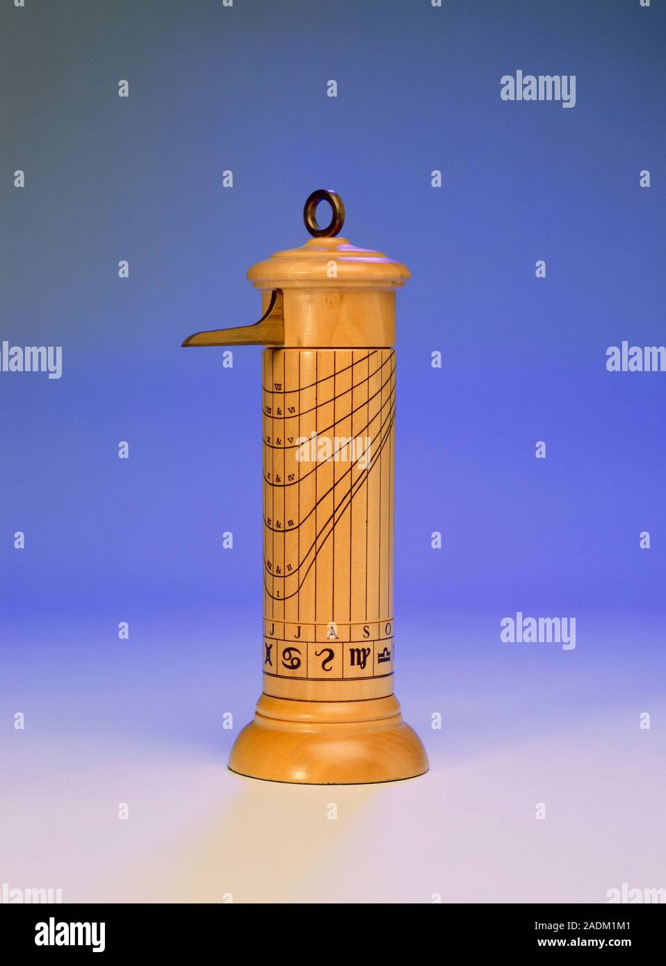 Modern, wooden pillar sundial Stock Photo - Alamy