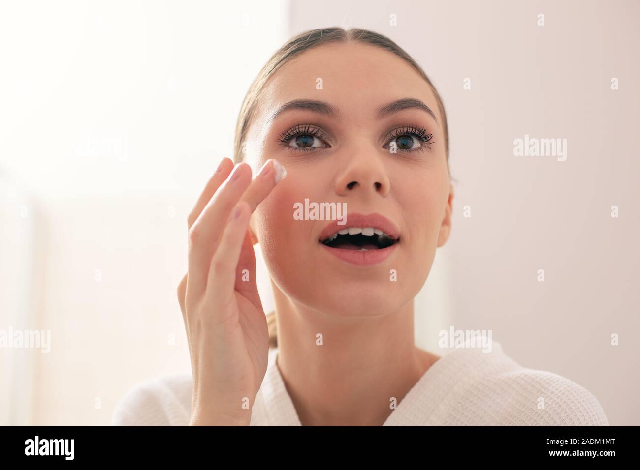 Face female cream attractive hi-res stock photography and images - Alamy