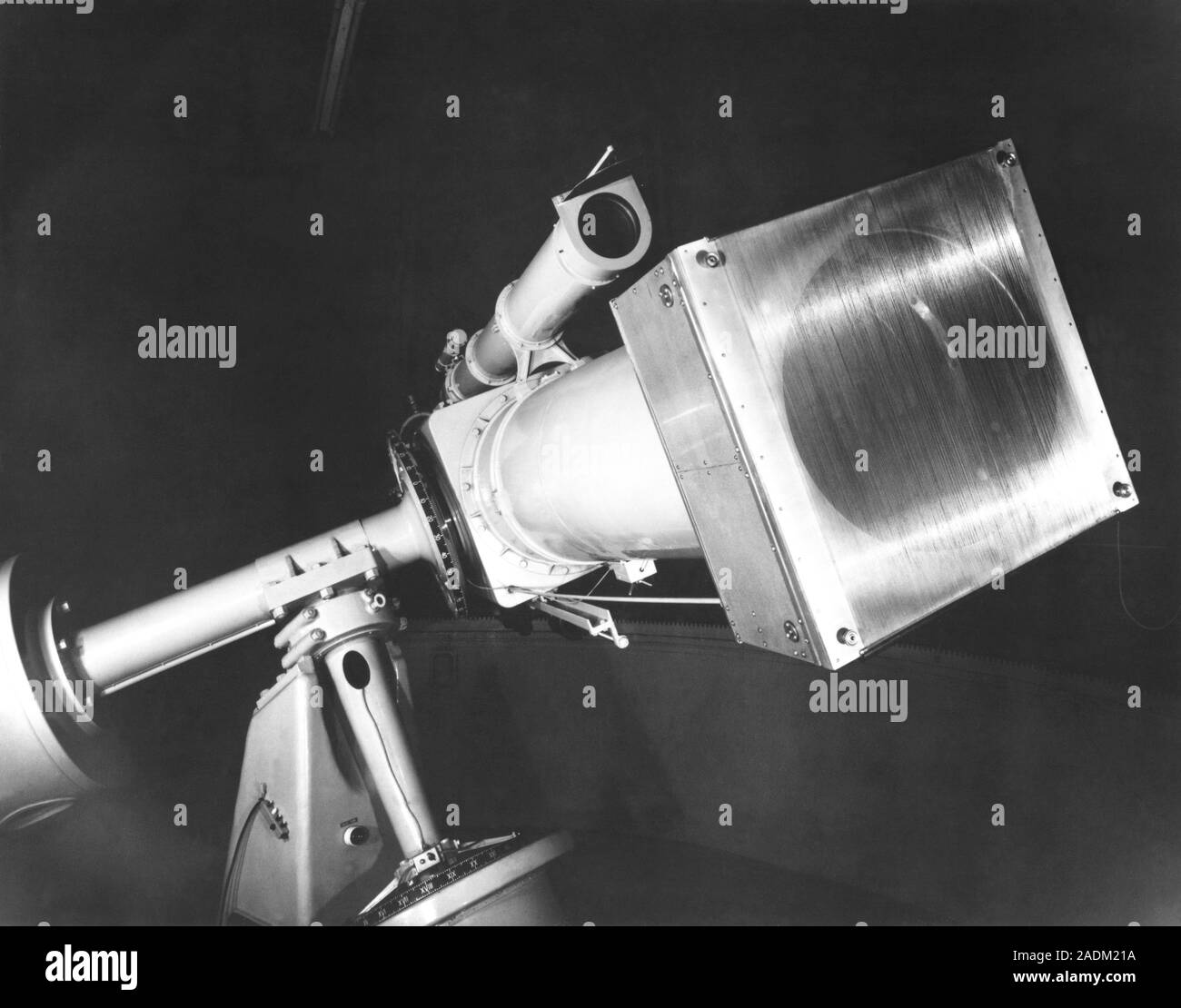 Schmidt telescope and spectrograph. The apparatus seen here is used to ...