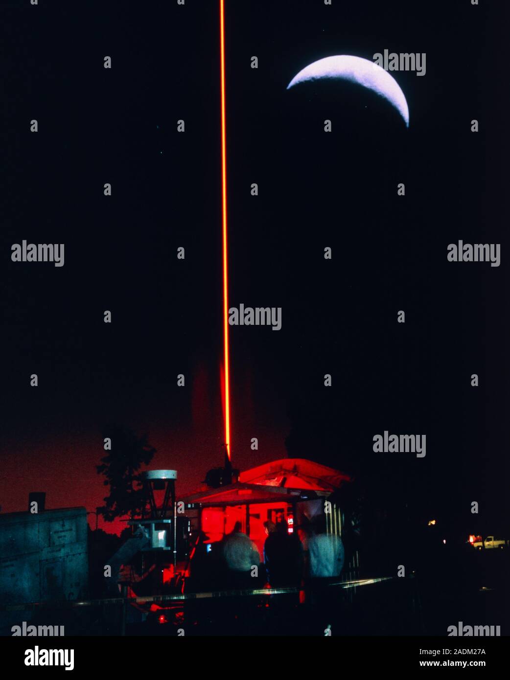 Laser guide star project. View of a laser beam being sent into the ...