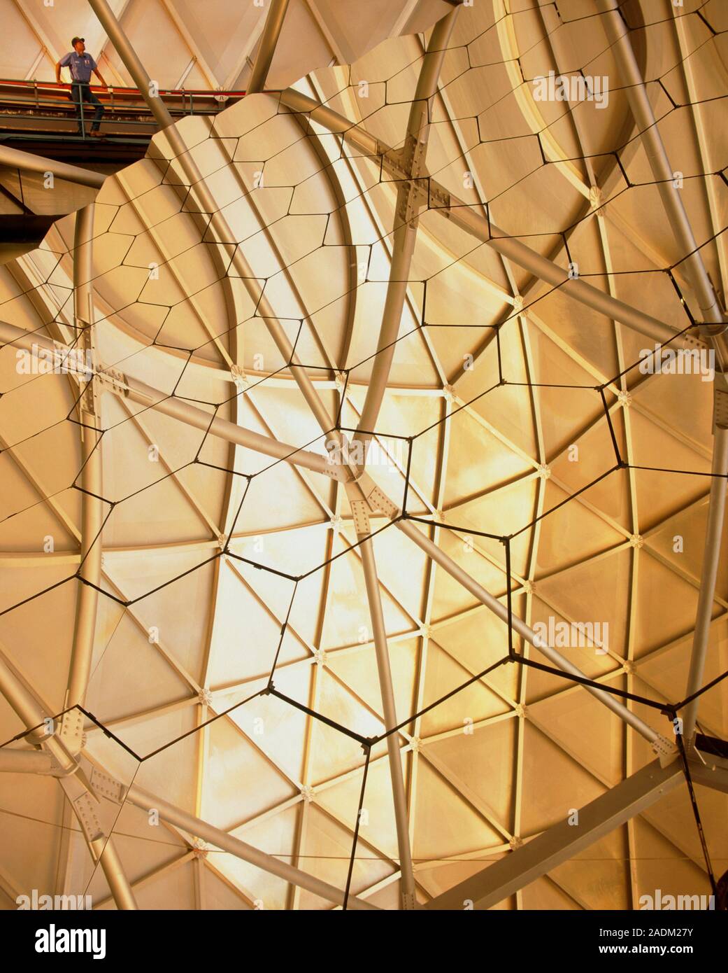 Hobby-Eberly telescope. Astronomer with the primary mirror of the Hobby ...