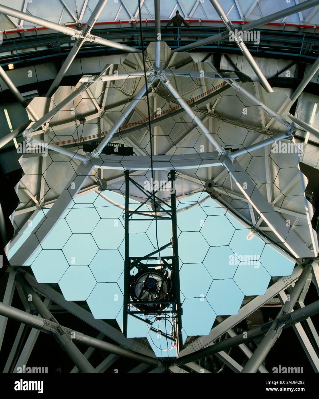 Hobby-Eberly telescope. Astronomer with the primary mirror of the Hobby ...
