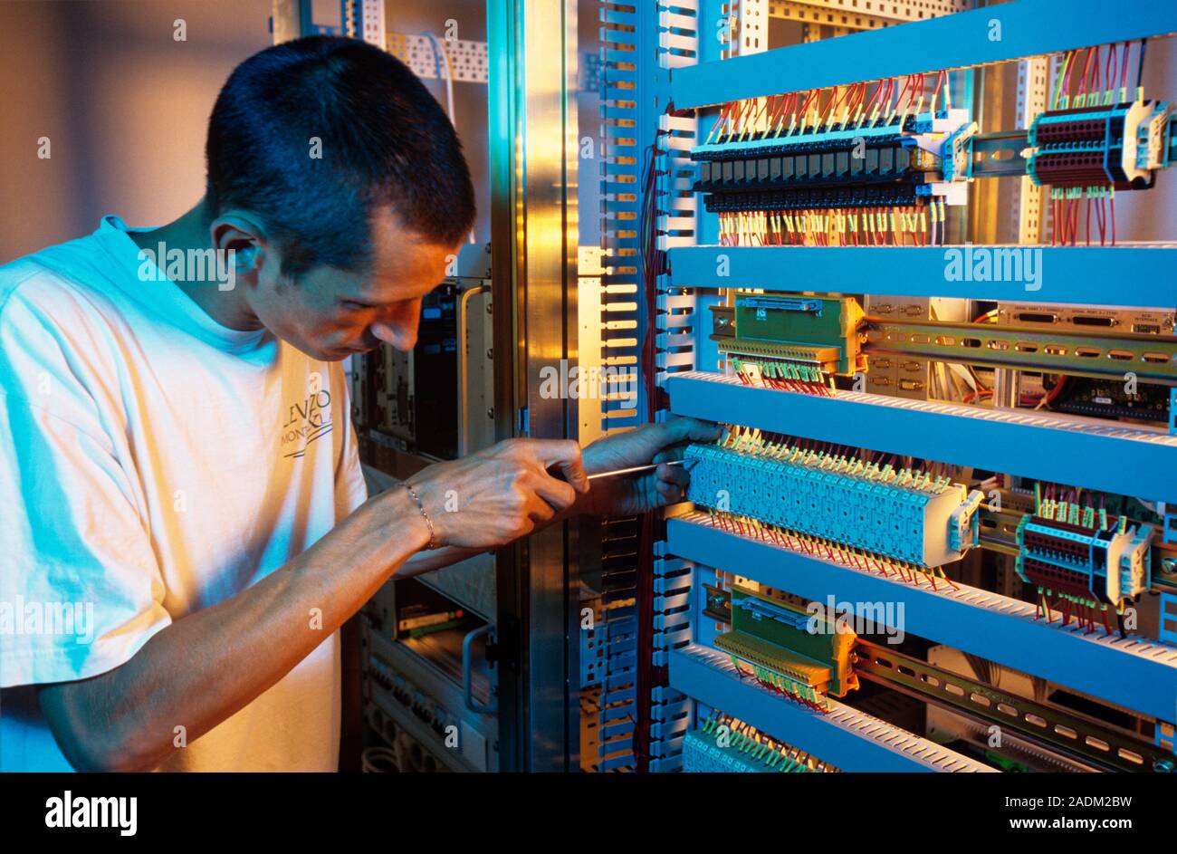 VLT Survey Telescope electronics. Engineer working on electronics for ...