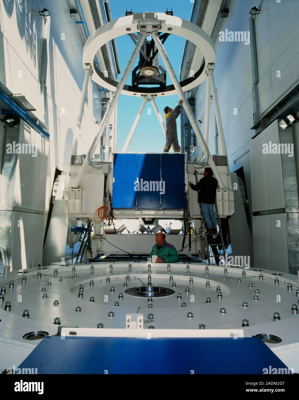Galileo National Telescope (TNG). Technicians work on the mirror ...