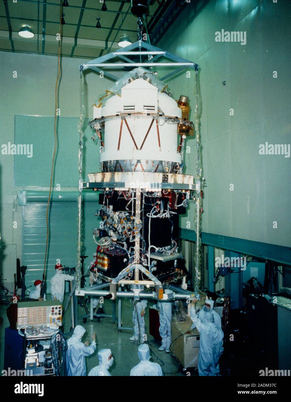 The Cosmic Background Explorer (COBE) satellite under construction at ...