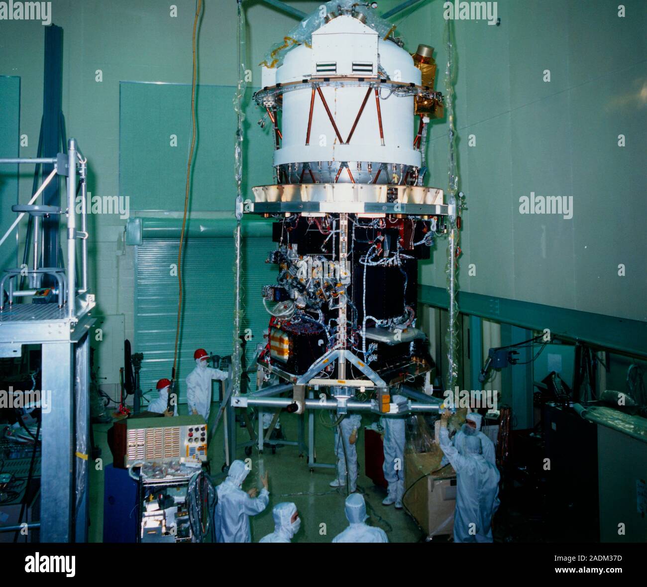 The Cosmic Background Explorer (COBE) satellite under construction at ...