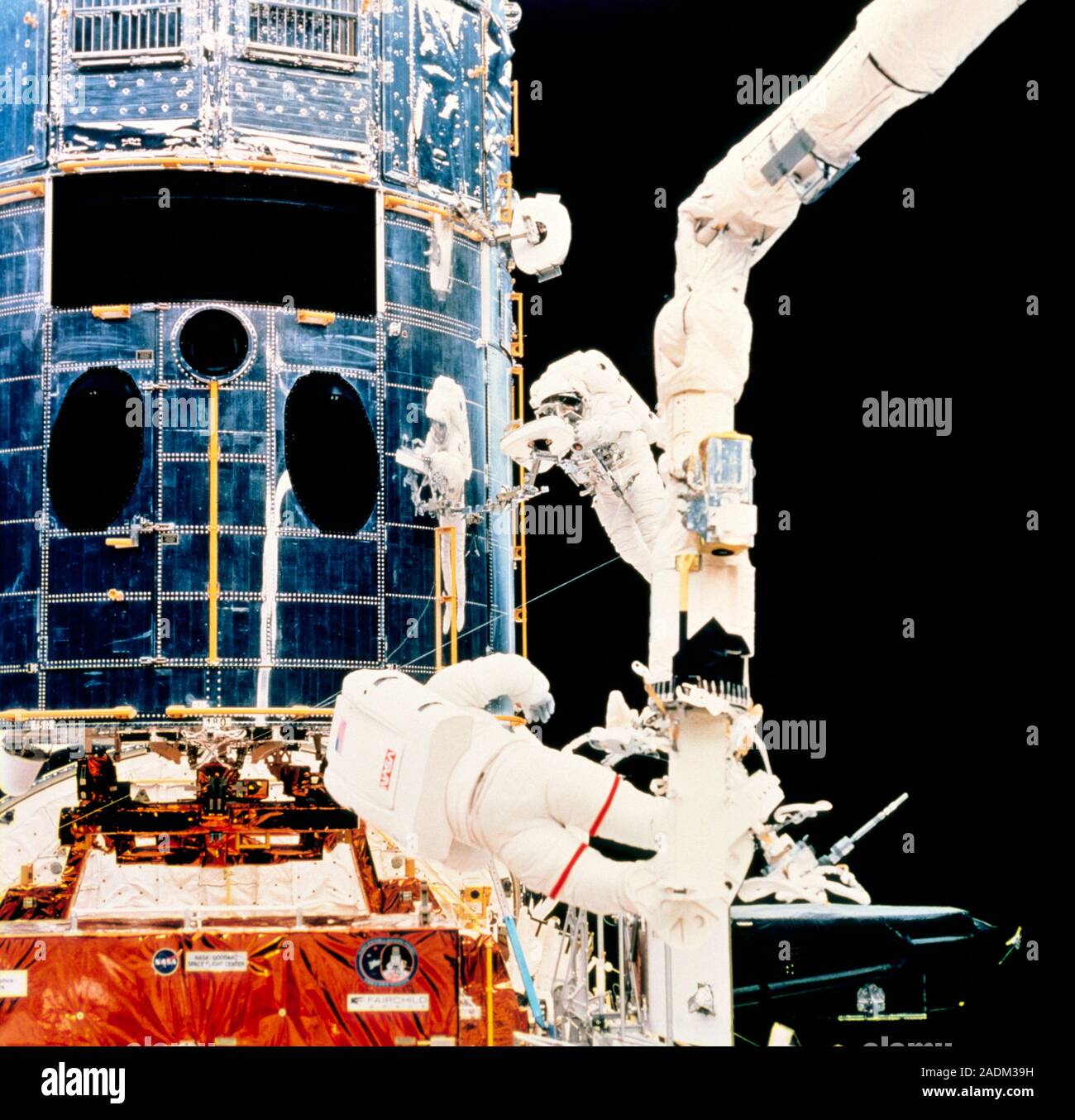 Servicing the Hubble Space Telescope. Astronauts Jeffrey Hoffman ...