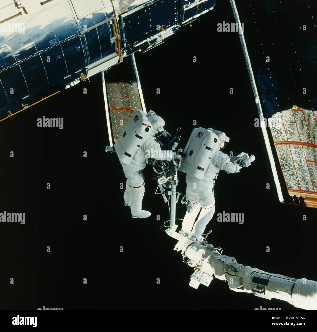 Hubble Telescope servicing. Astronauts perform an ExtraVehicular ...
