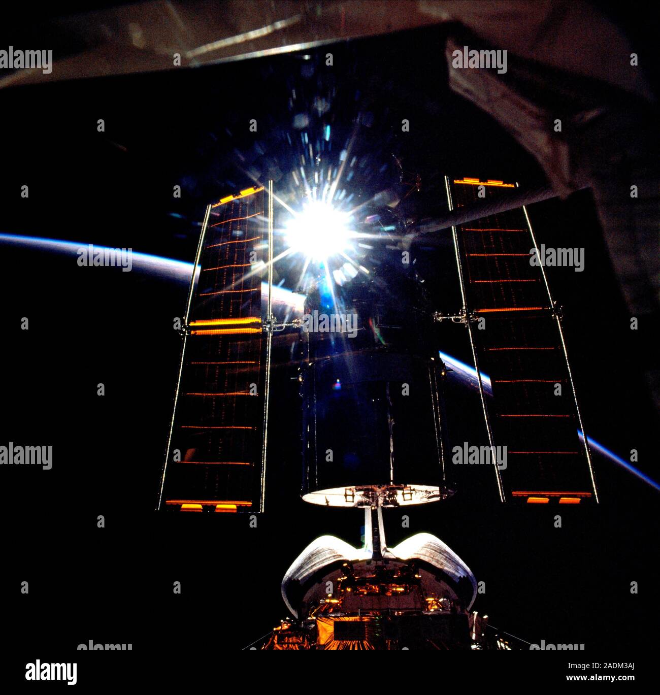 Hubble Space Telescope. Sun reflecting off the Hubble Space Telescope ...