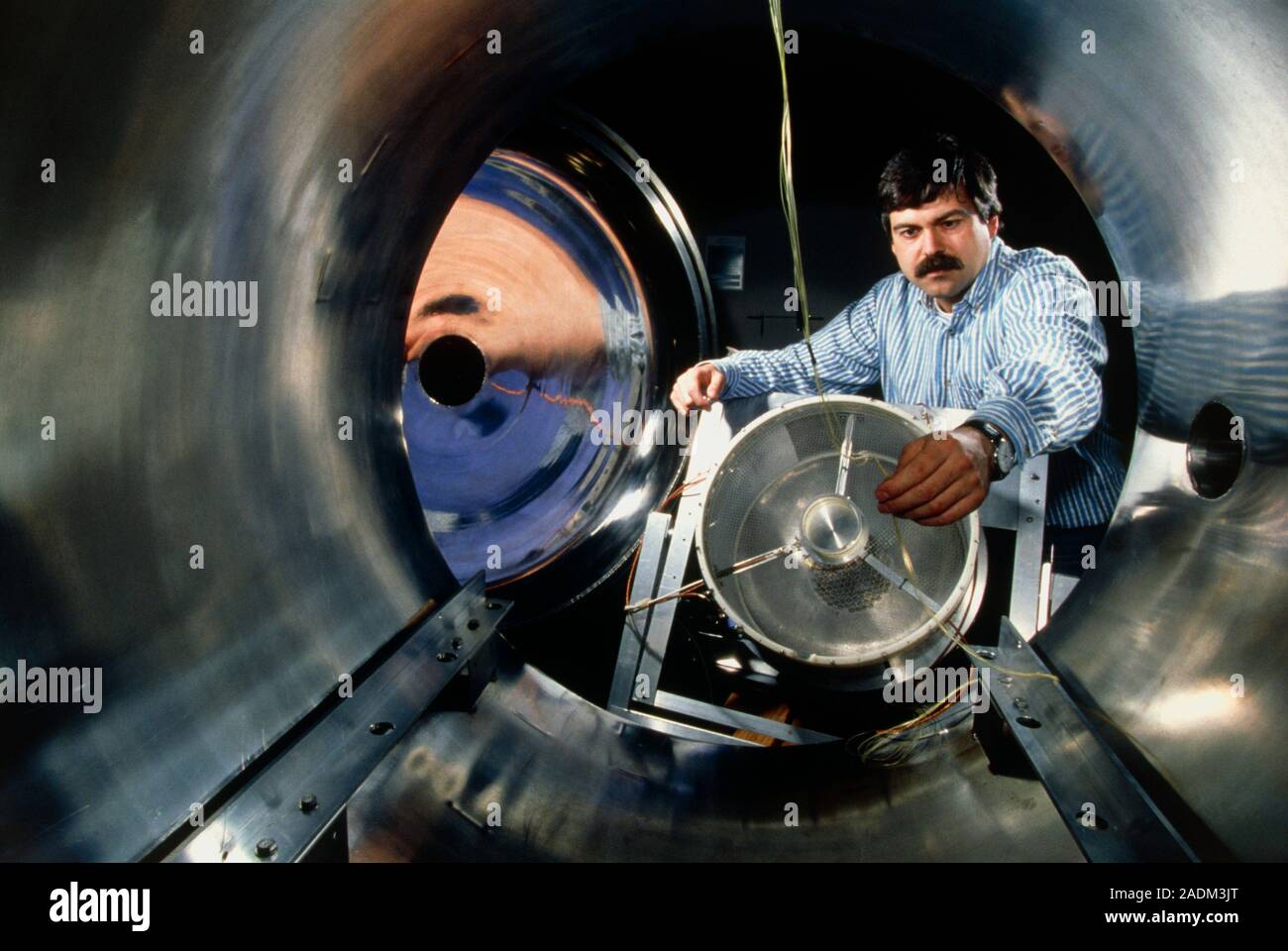 Cosmic dust analyser testing. Dr Simon Green places the Cosmic Dust ...
