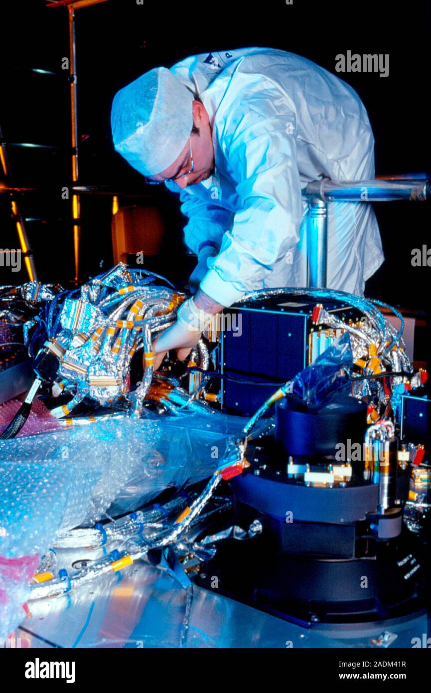 Mars Express spacecraft construction. Engineer checking the position of ...