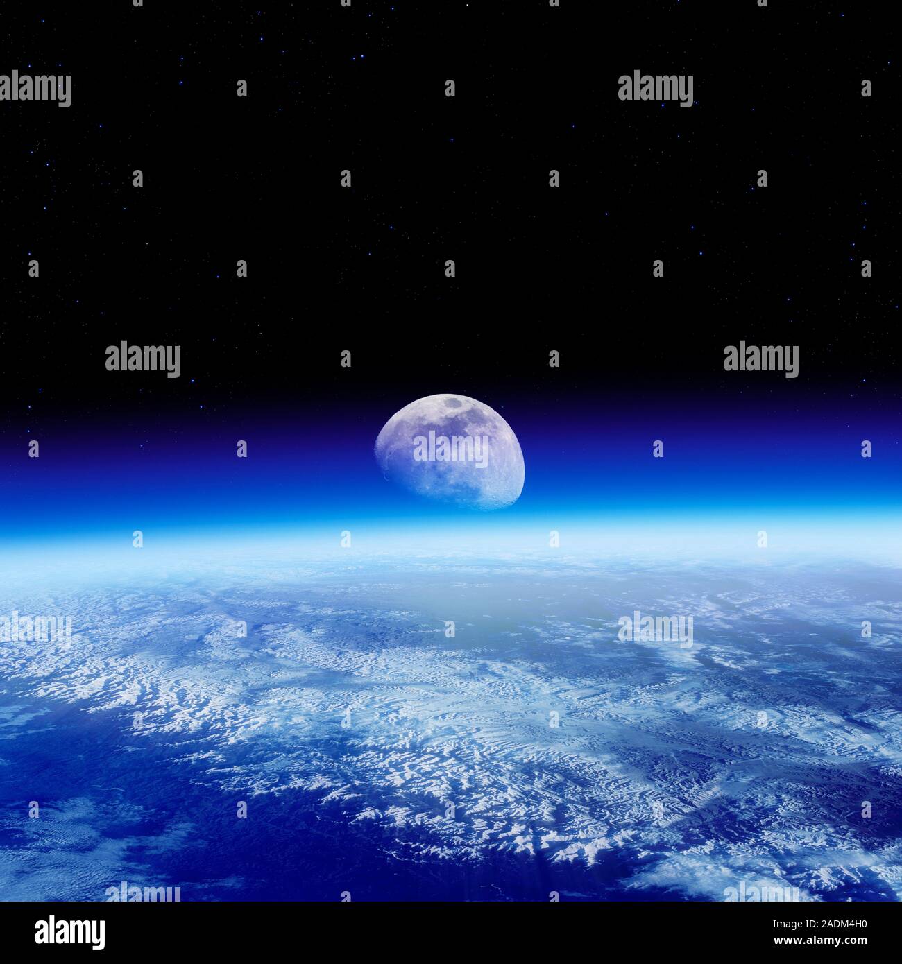 Moon rising over Earth's horizon, composite image. The blue haze of ...
